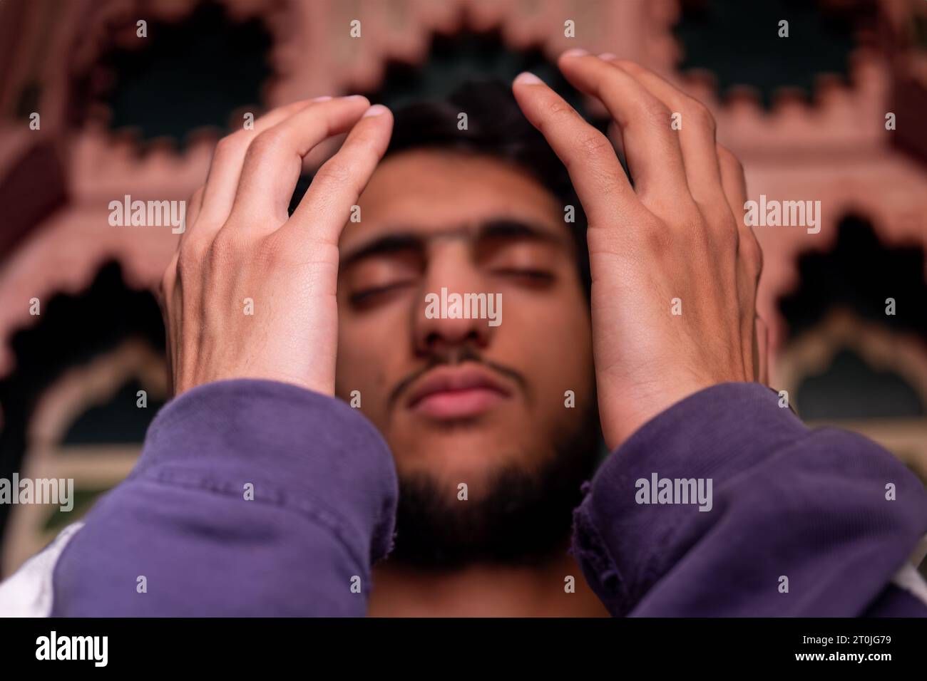 muslim male rising his hands to pray for allah and asking for ...
