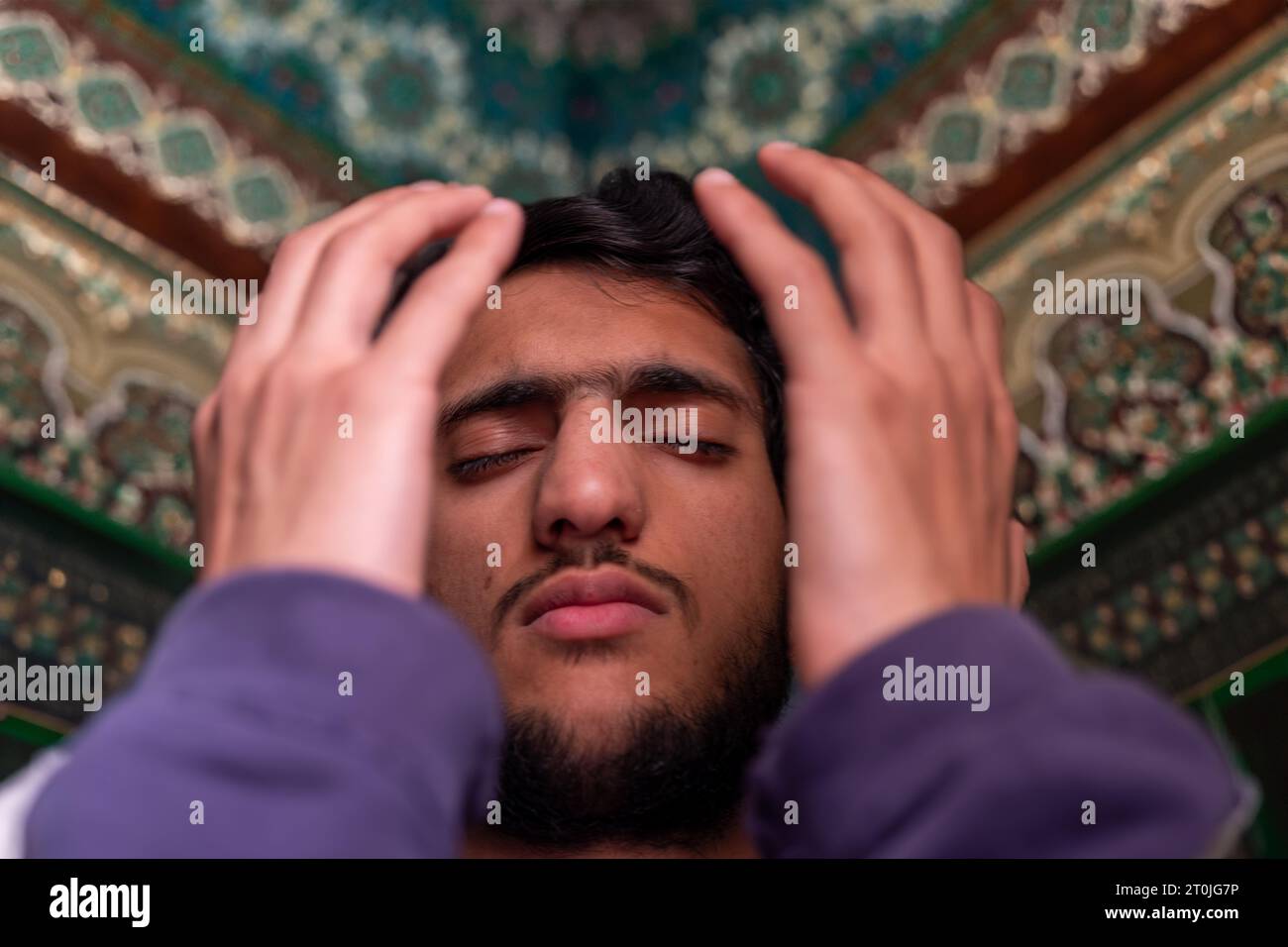 muslim male rising his hands to pray for allah and asking for ...