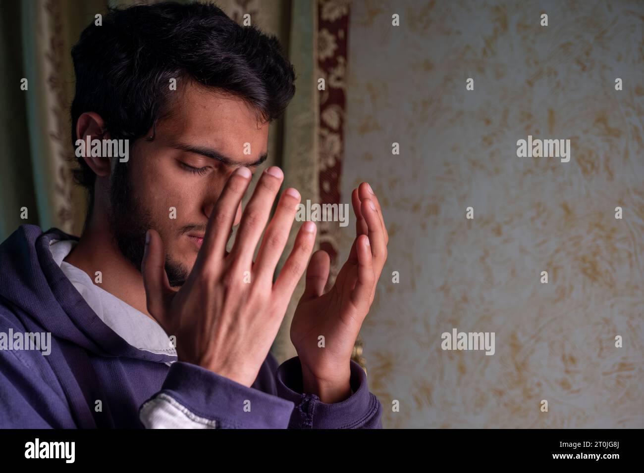 muslim male rising his hands to pray for allah and asking for ...