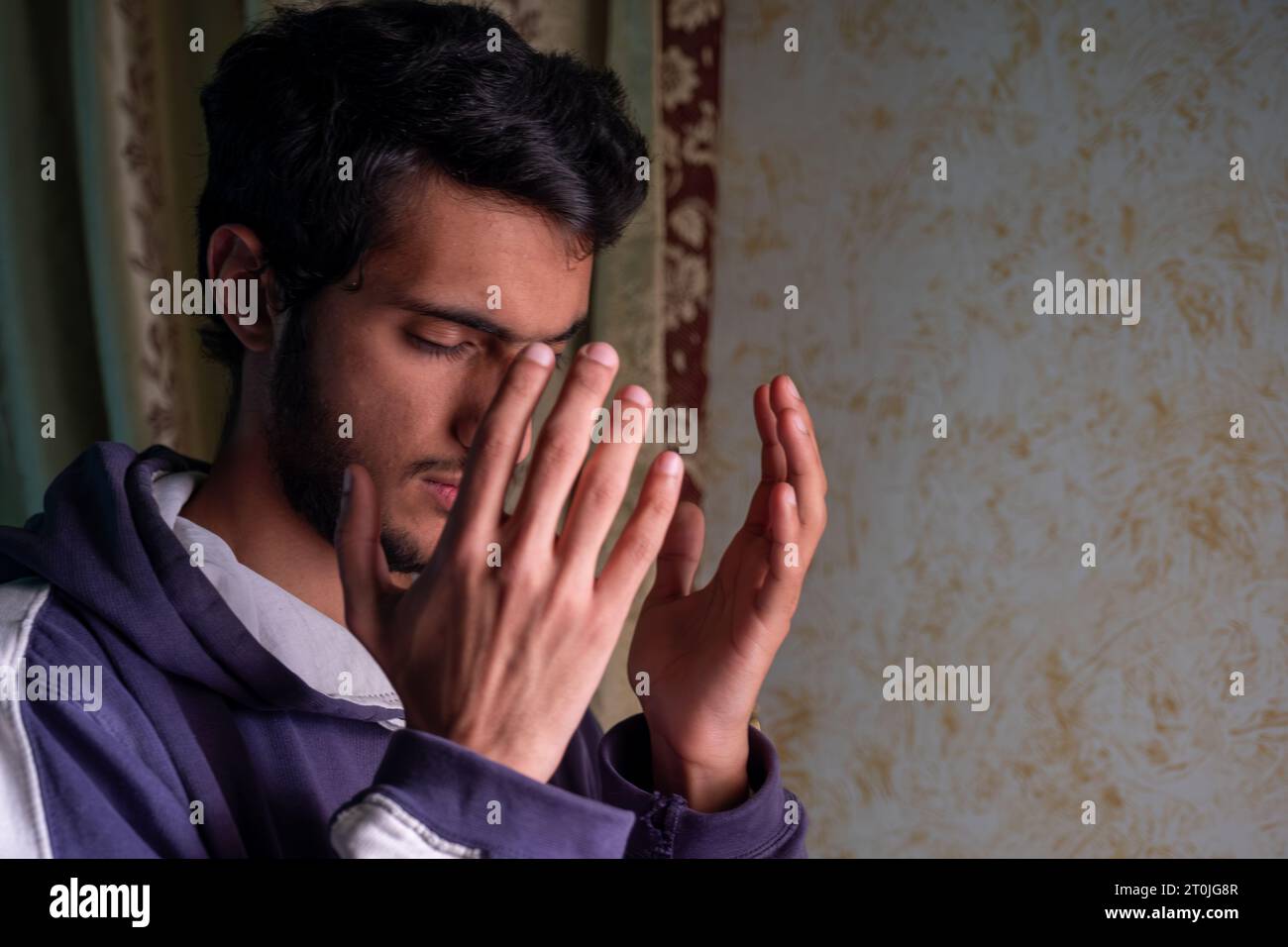 muslim male rising his hands to pray for allah and asking for ...
