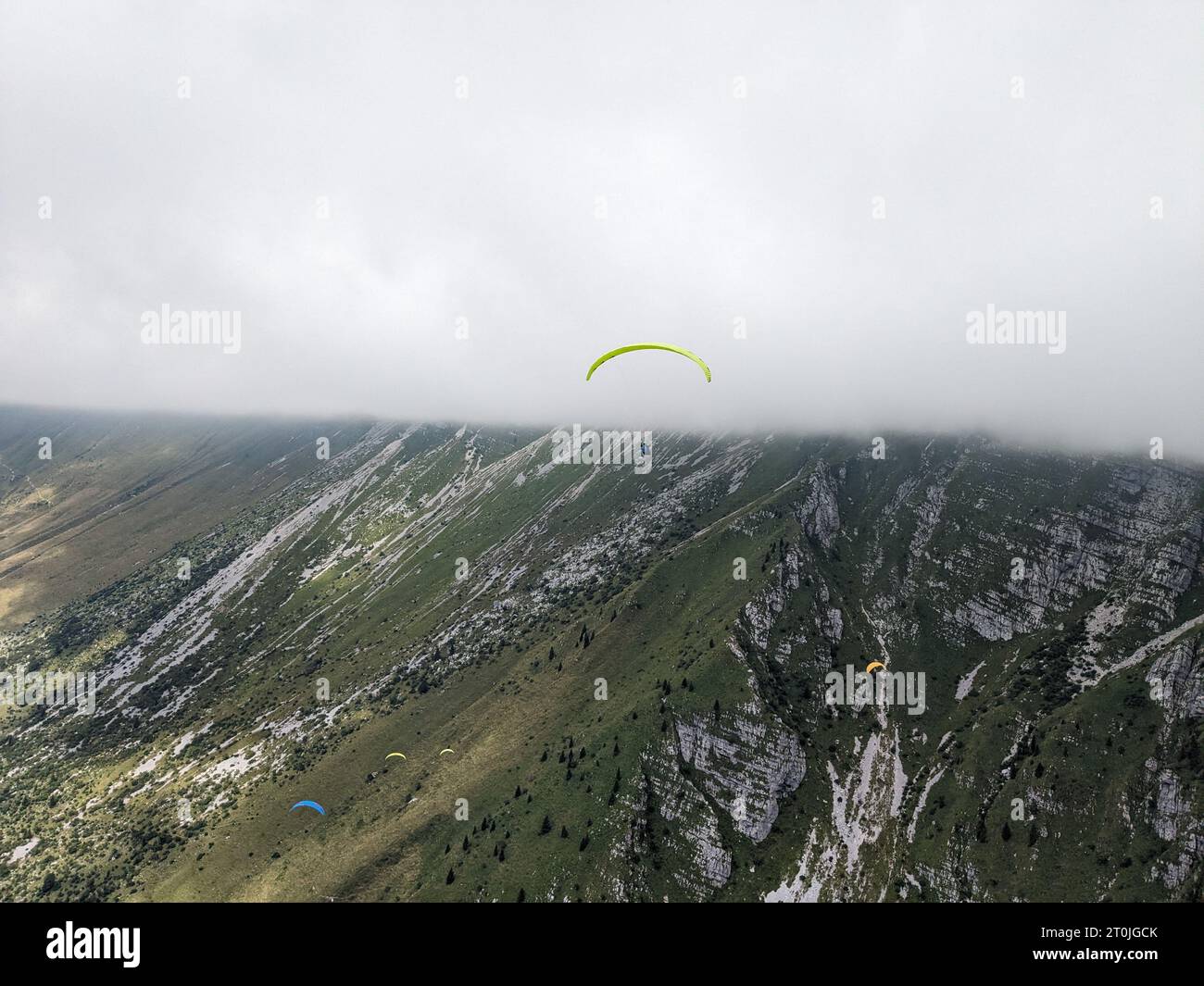 Paragliding flying above Julian Alps in Slovenia,Europe, Tolmin area ...