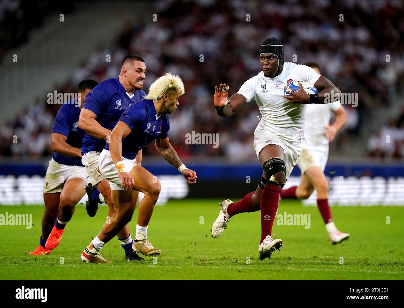 England's Maro Itoje tries to avoid being tackled by Samoa's Jonathan ...