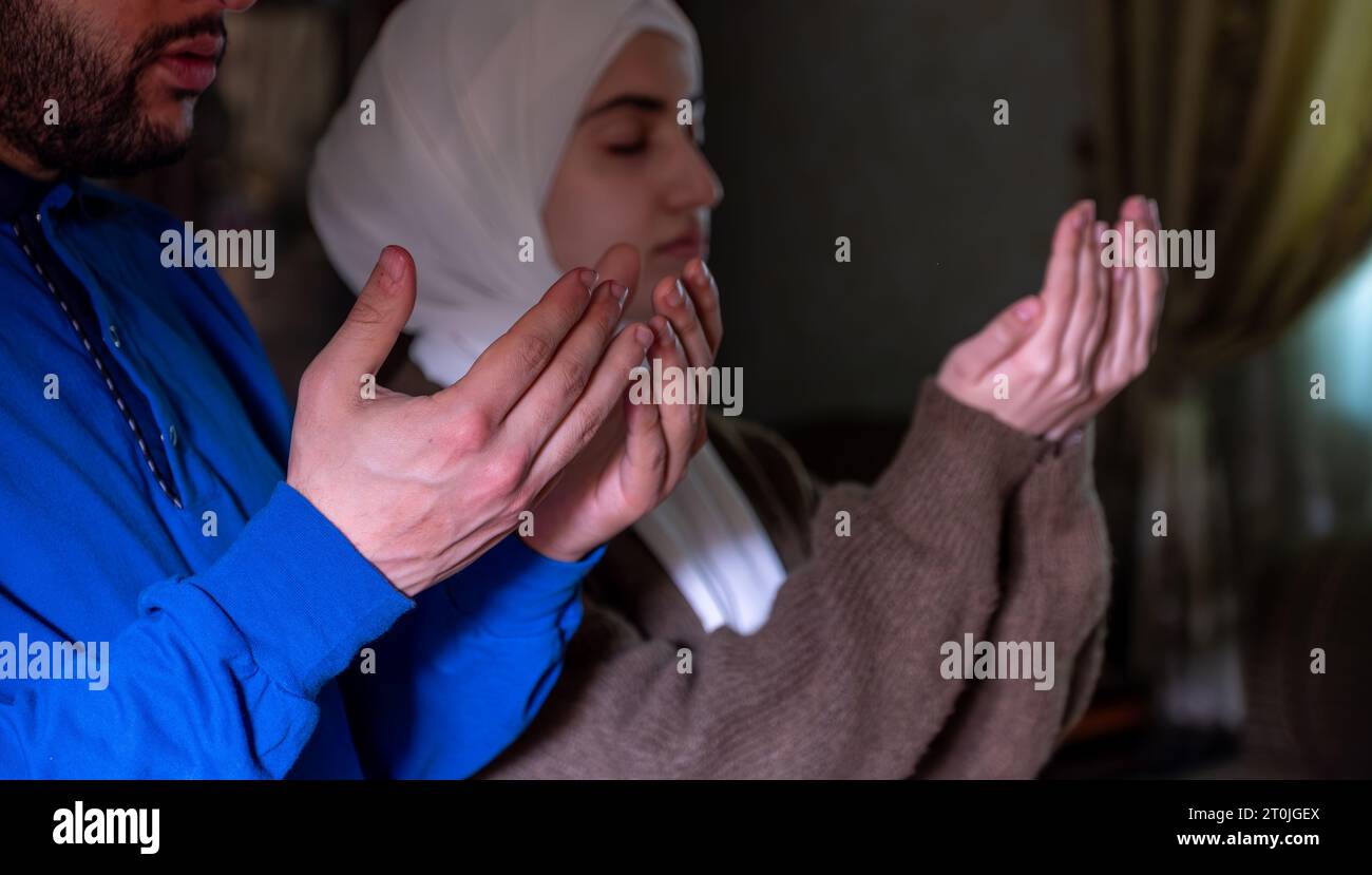 muslim couples praying together asking allah for mercy and forgiveness ...