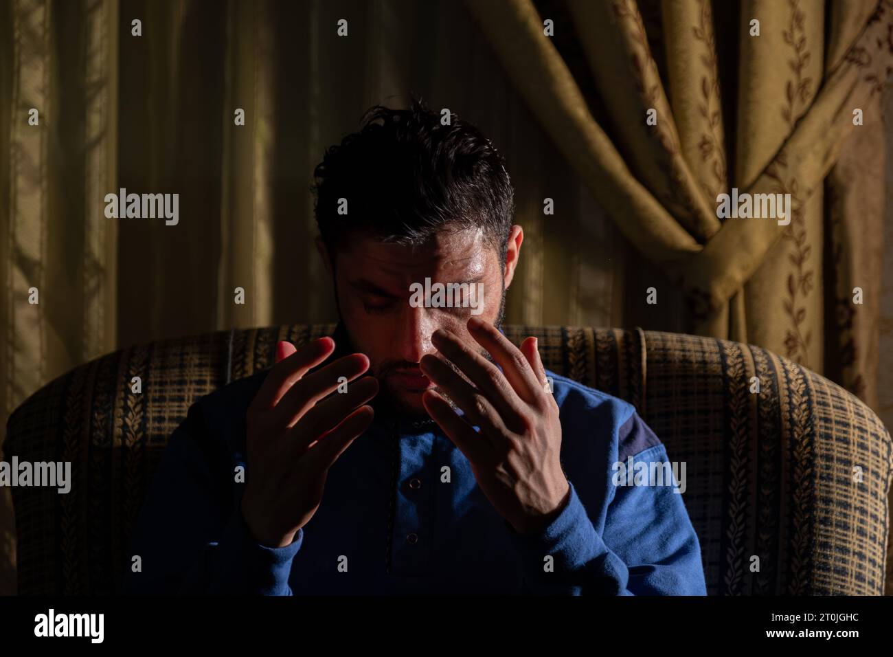 muslim male rising his hands to pray for allah and asking for ...