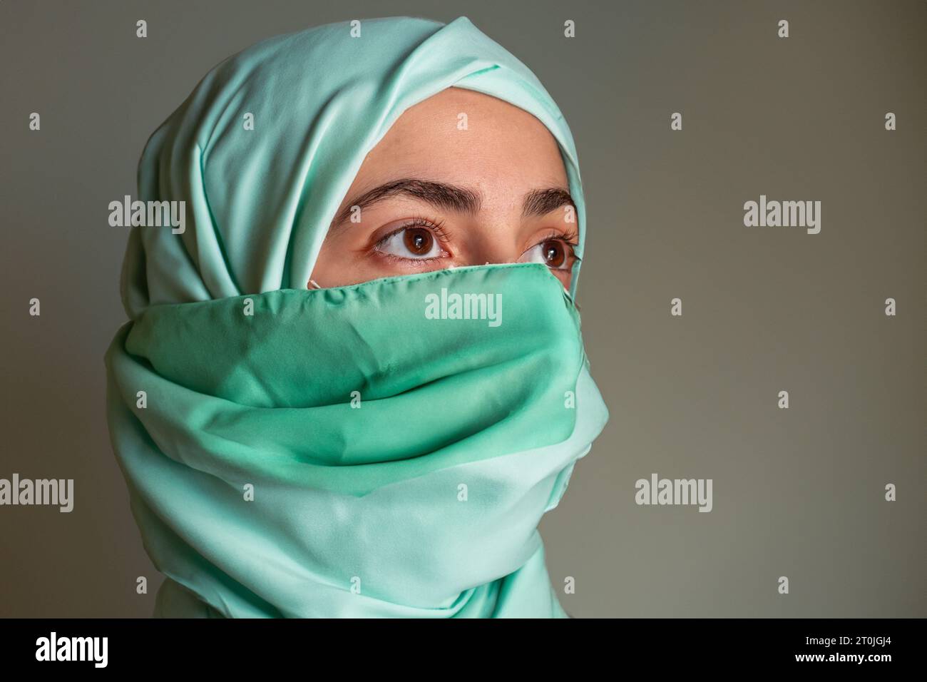 Muslim woman wearing mask and praying for allah to protect her from ...