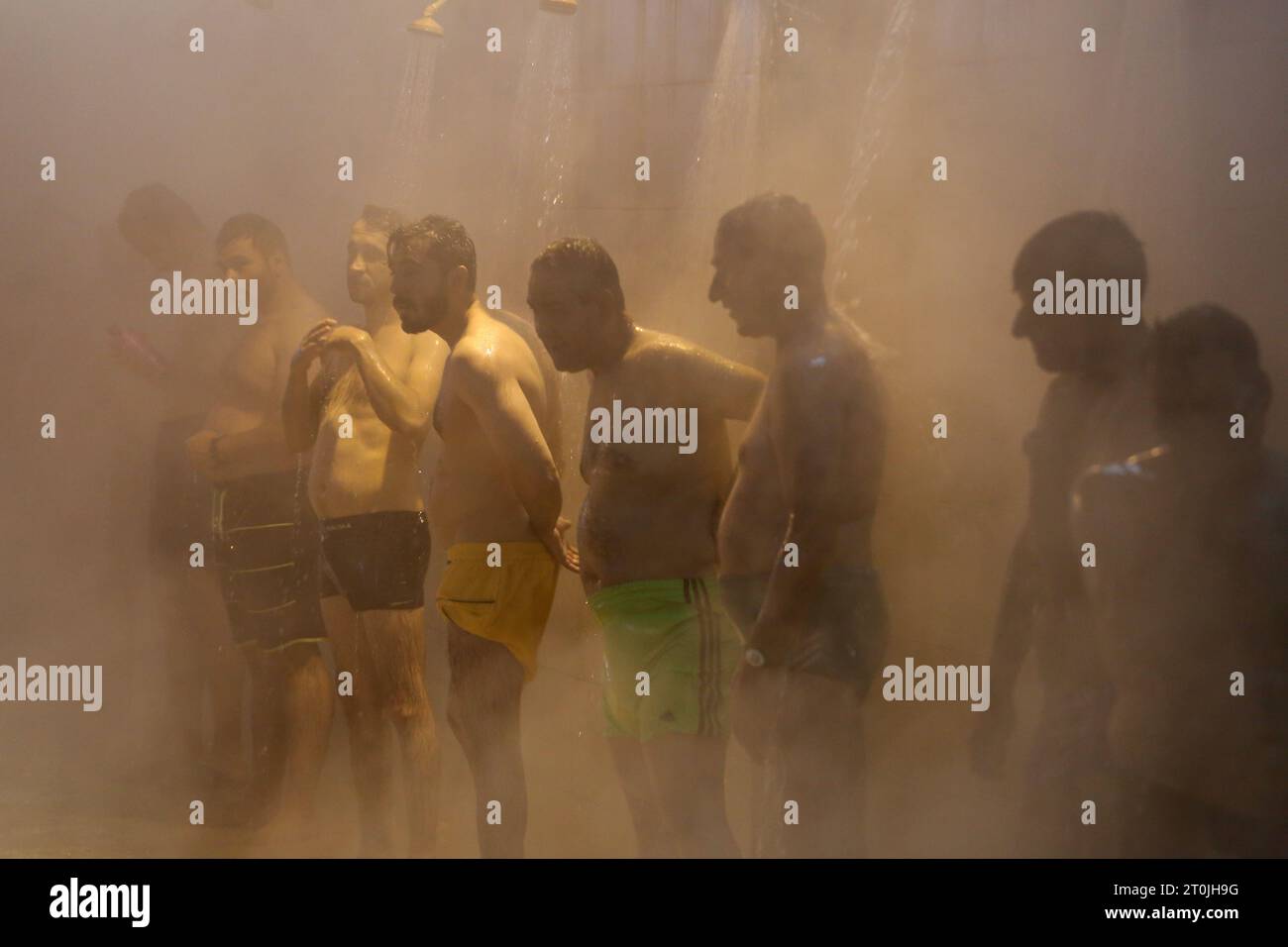 Sarein, Ardabil, Iran. 5th Oct, 2023. Iranian men take showers at the ...