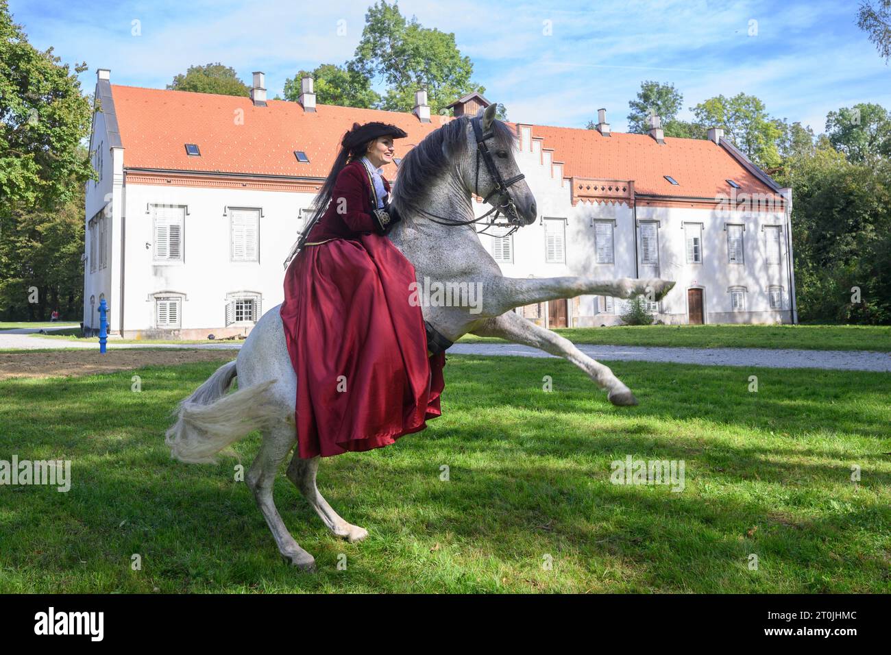 Zapresic, Croatia. 07th Oct, 2023. Woman dressed in crinolines ride a ...