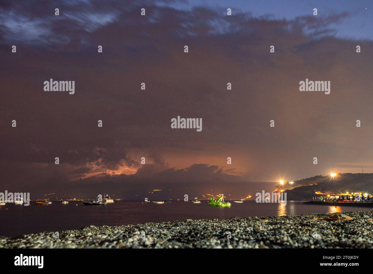 Seascape at night with thunderstorm Stock Photo - Alamy