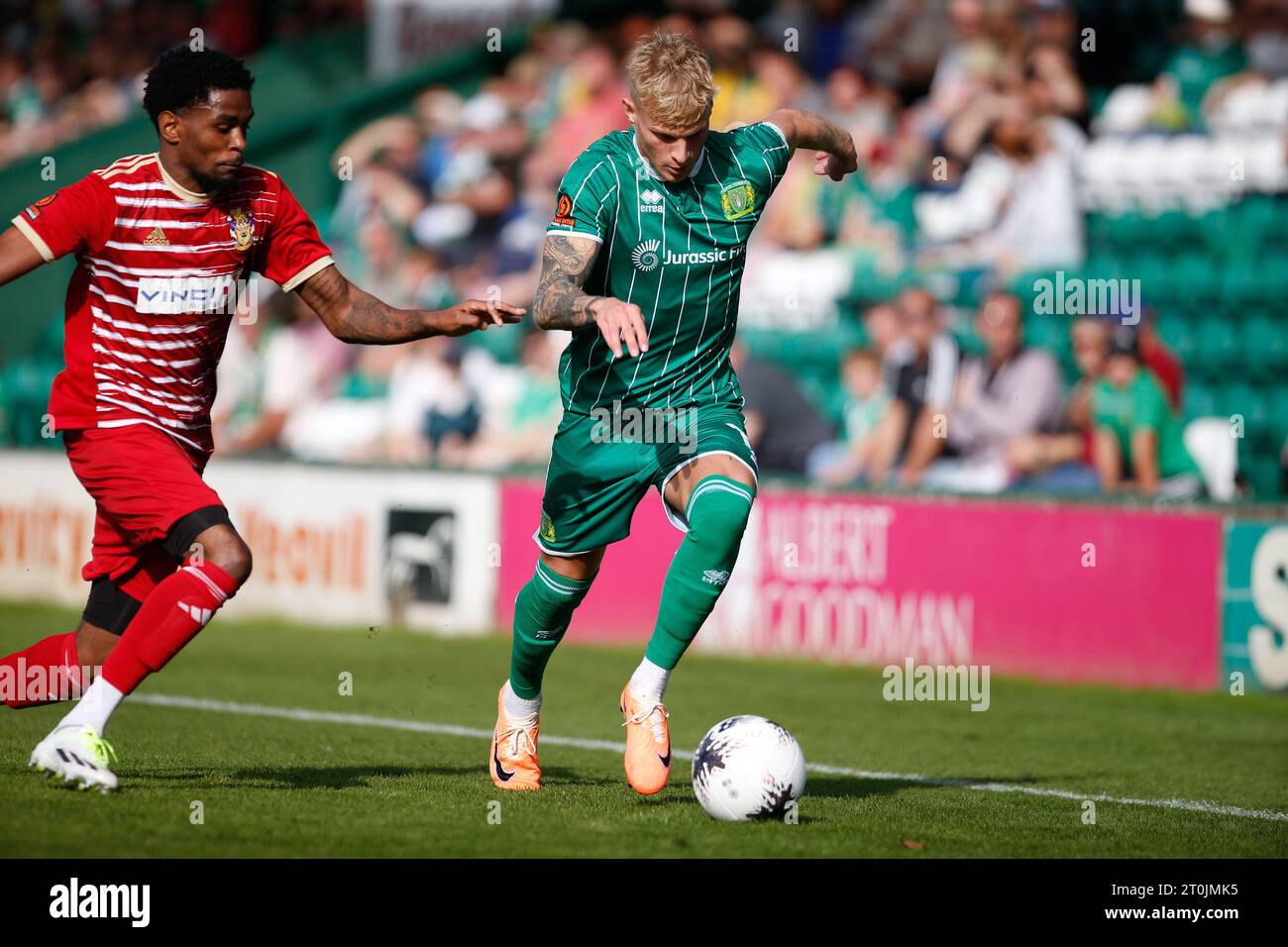 Will Dawes of Yeovil Town and Jason Ring of Aveley Town during the ...