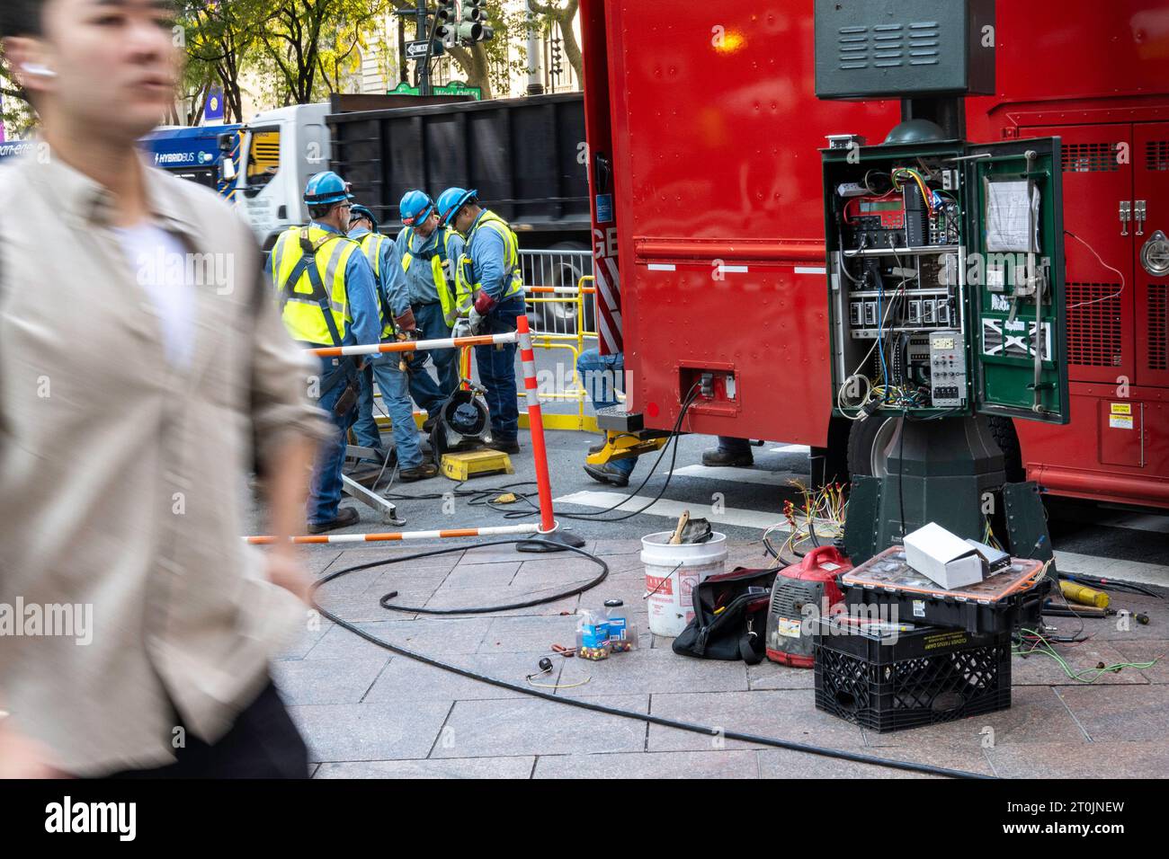 City utility workers shoring up an electrical problem at the ...