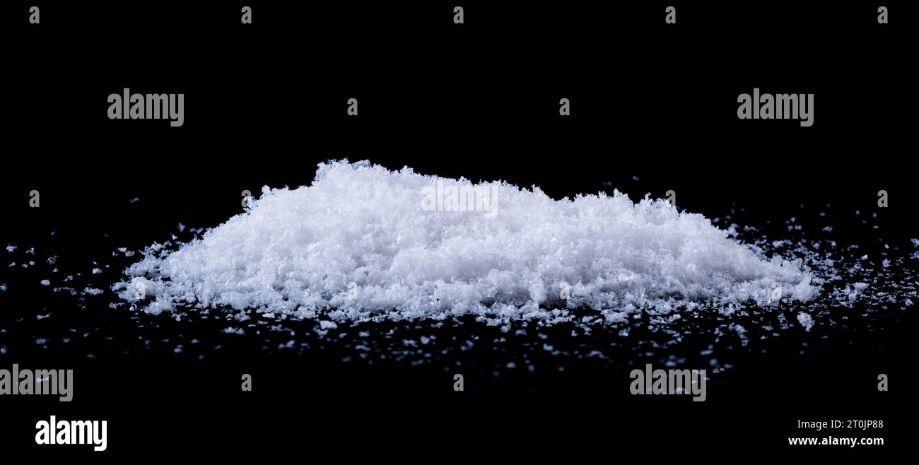 Pile of snow isolated on a black background. Heap of snow overlay for ...