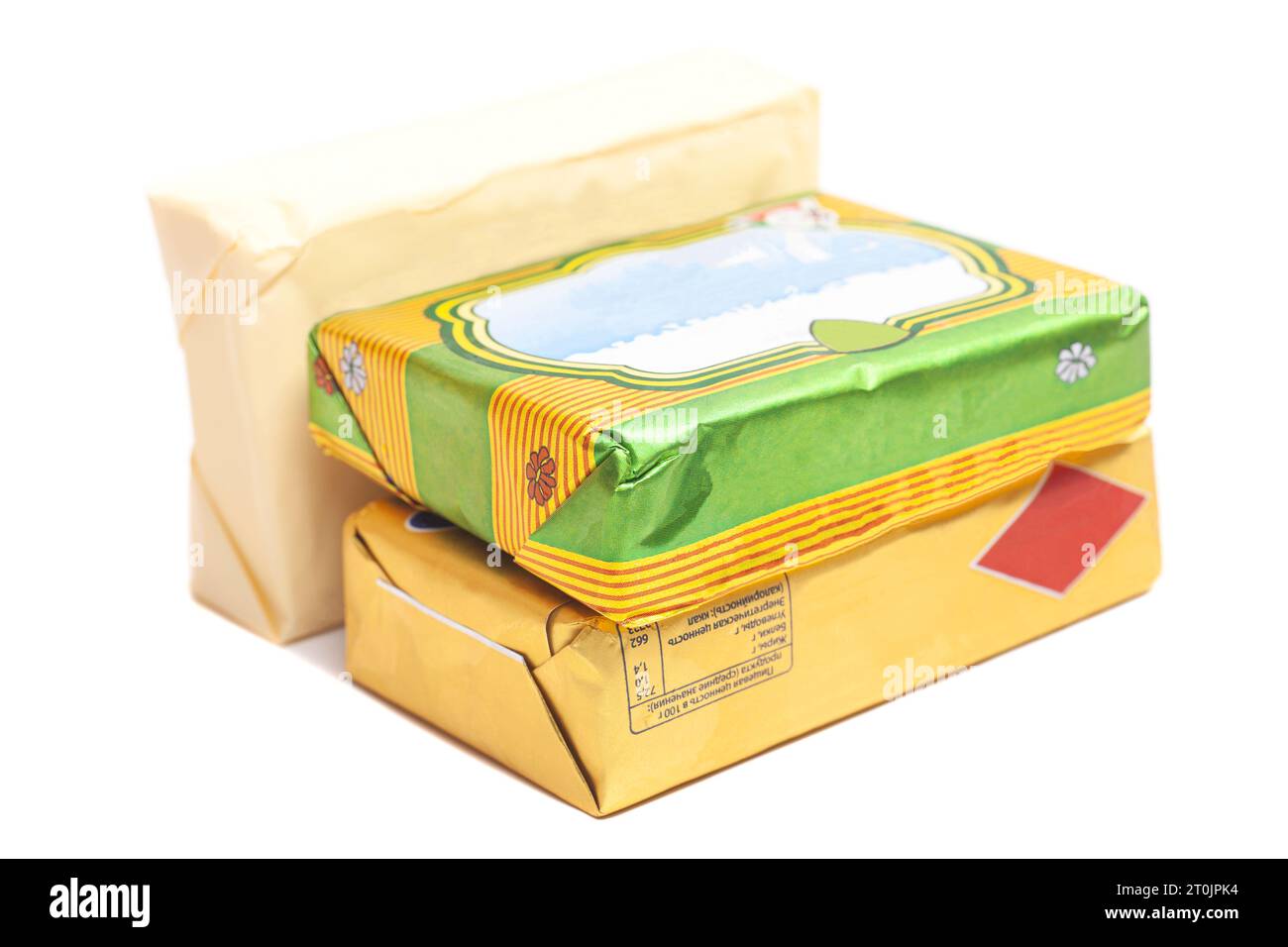 Sticks of wrapped butter isolated on white background Stock Photo - Alamy