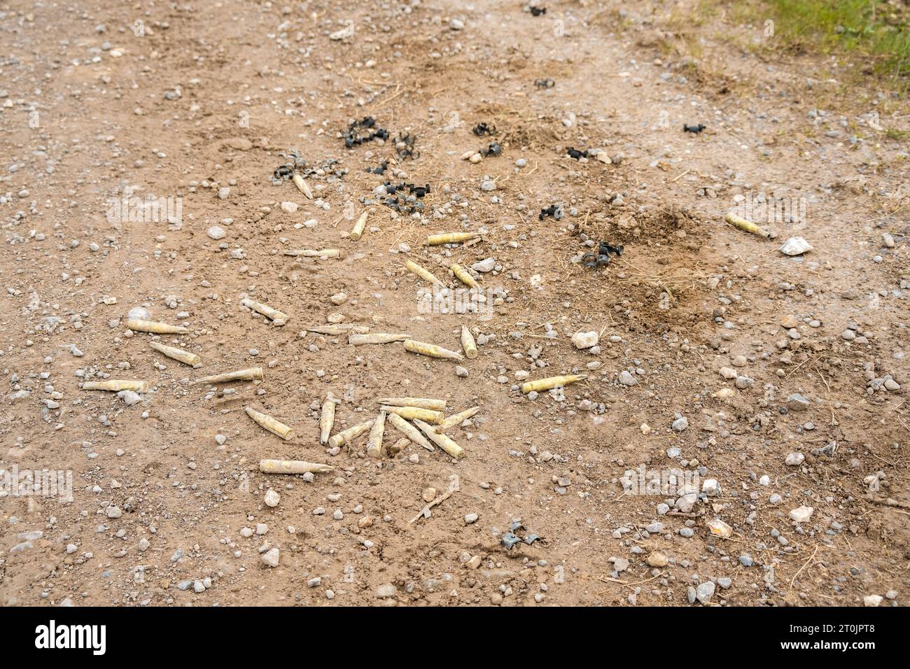 a collection of used British Army soldier brass bullet casings after a ...