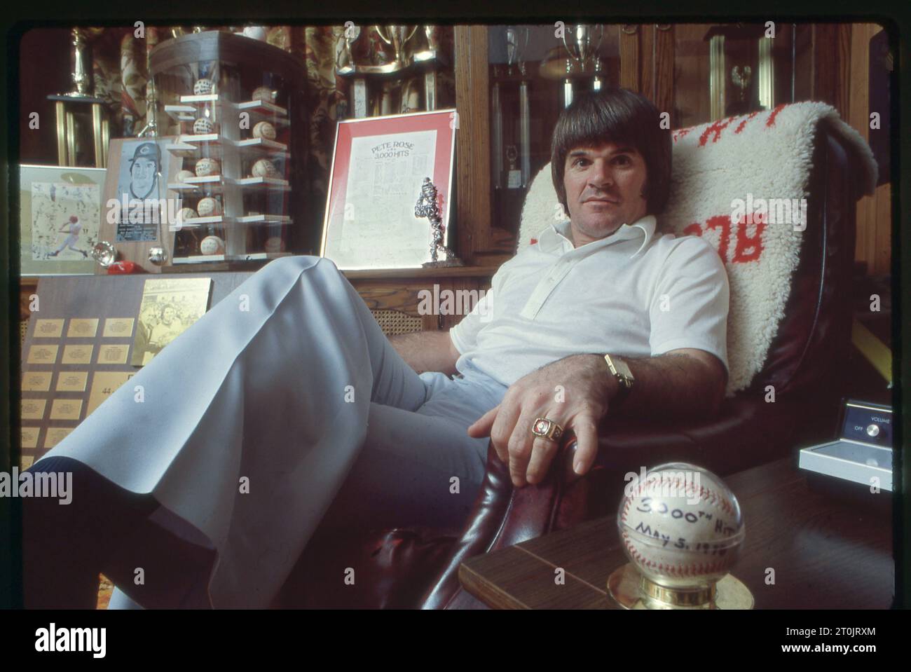 A 1979 posed portrait of Pete Rose at home in his trophy room in ...