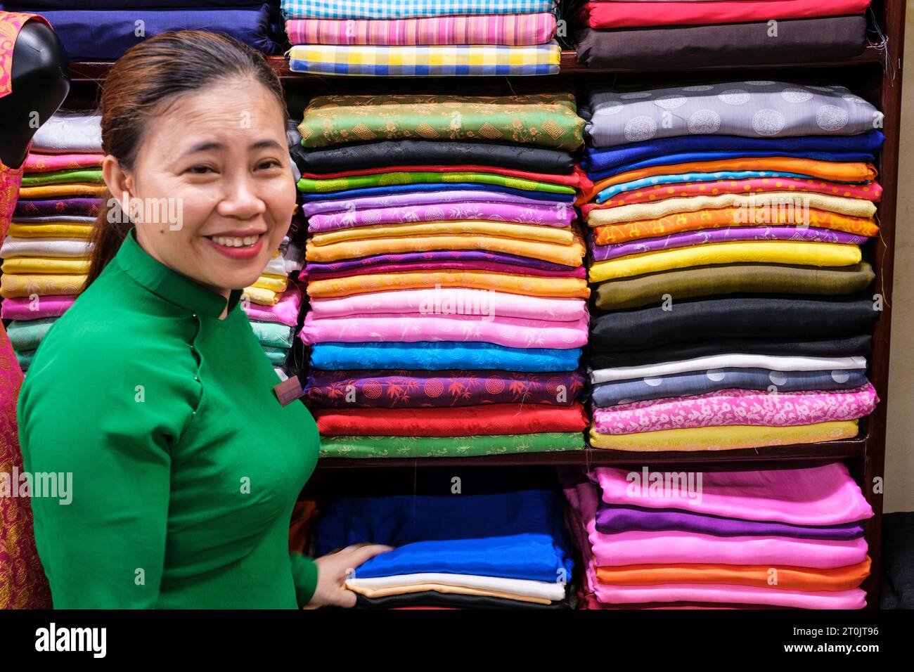 Hoi An, Vietnam. Silk Factory Manager and Silk Fabric Stock Photo - Alamy