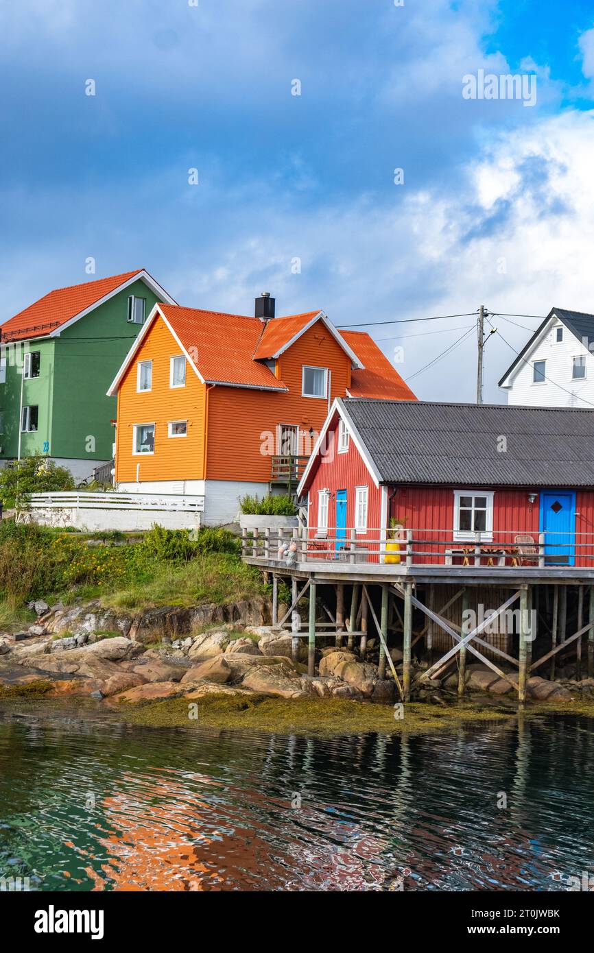 Traditional colorful pile houses at Henningsvaer, which is located at ...