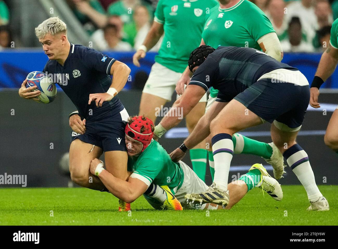 Scotland's Darcy Graham is tackled during the Rugby World Cup Pool B ...