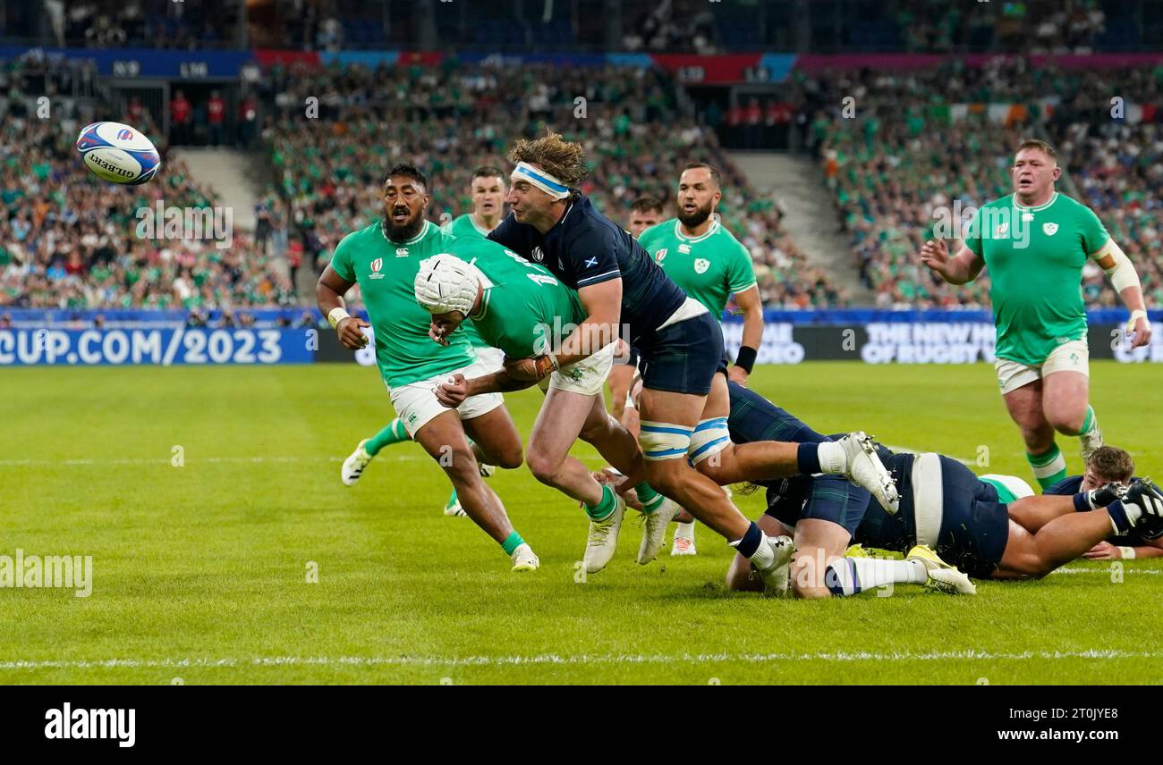 Ireland's Mack Hansen is tackled by Scotland's Jamie Ritchie during the ...