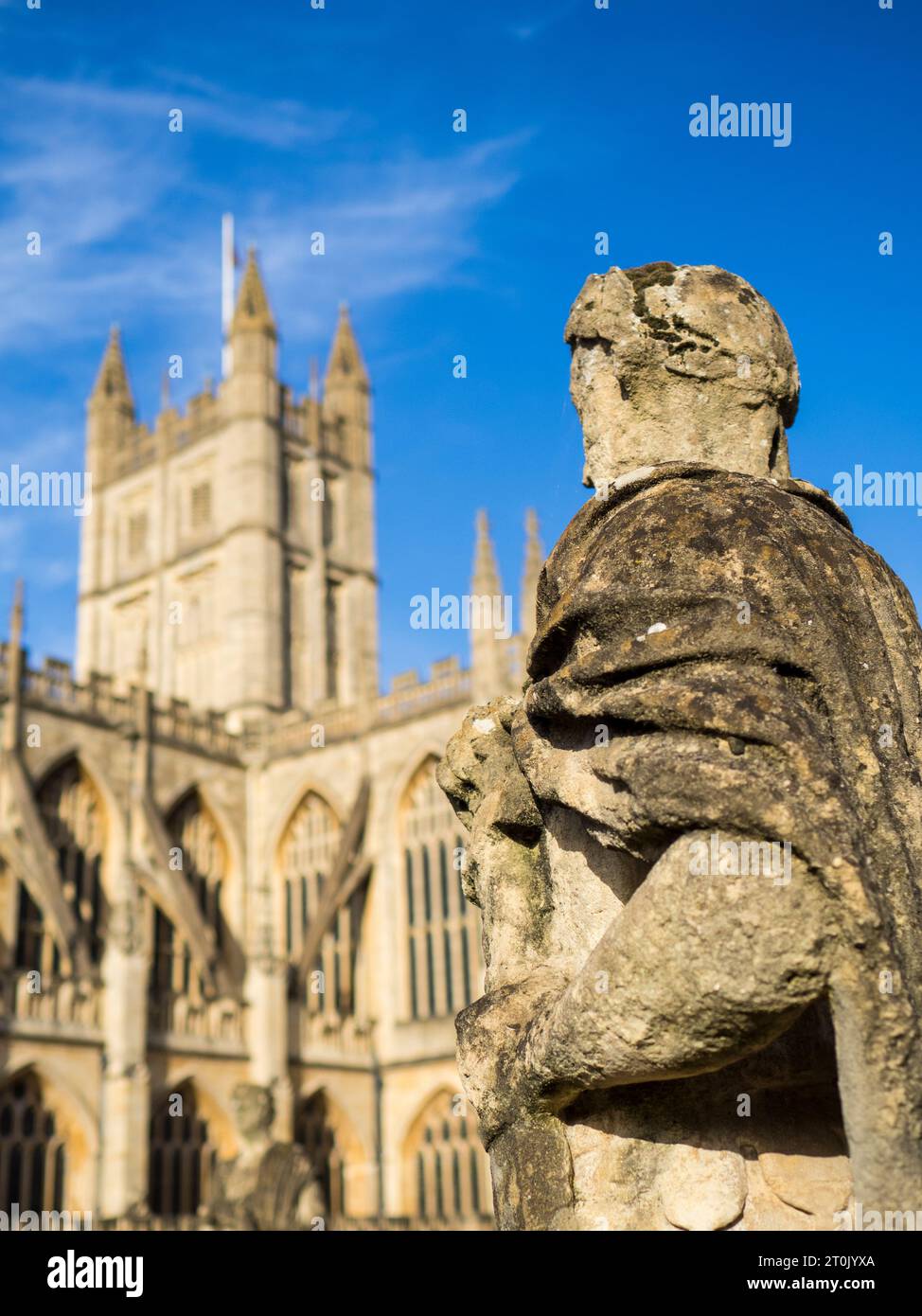 Roman Statute (Caesar) at the Roman Baths with Bath Abbey in the ...
