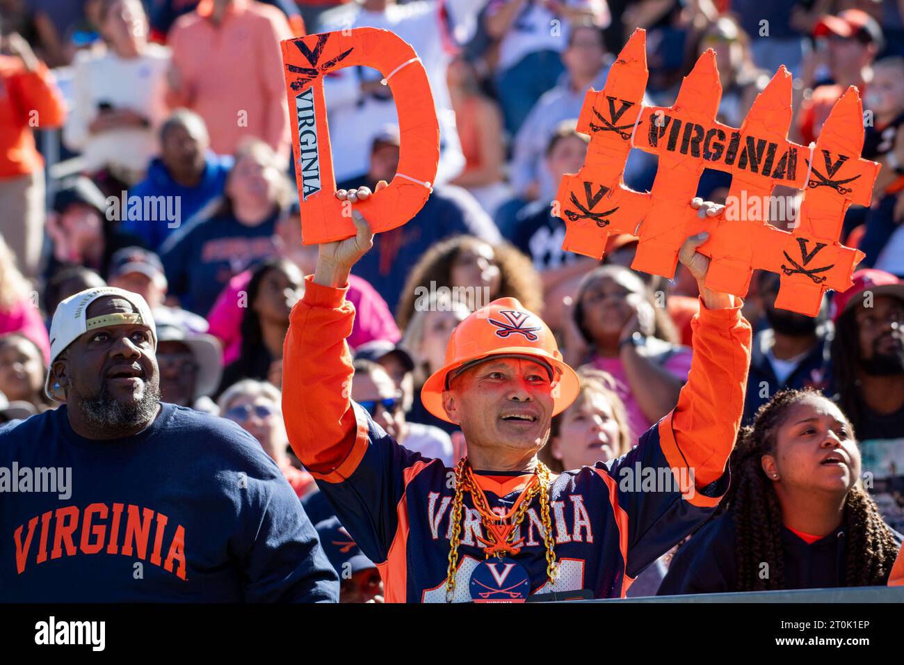 Virginia fans cheer on their team during an NCAA college football game ...
