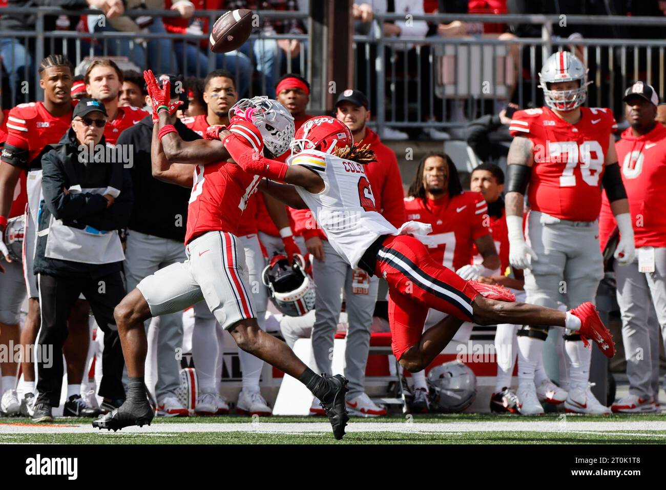 Ohio State receiver Marvin Harrison, left, makes a catch against ...