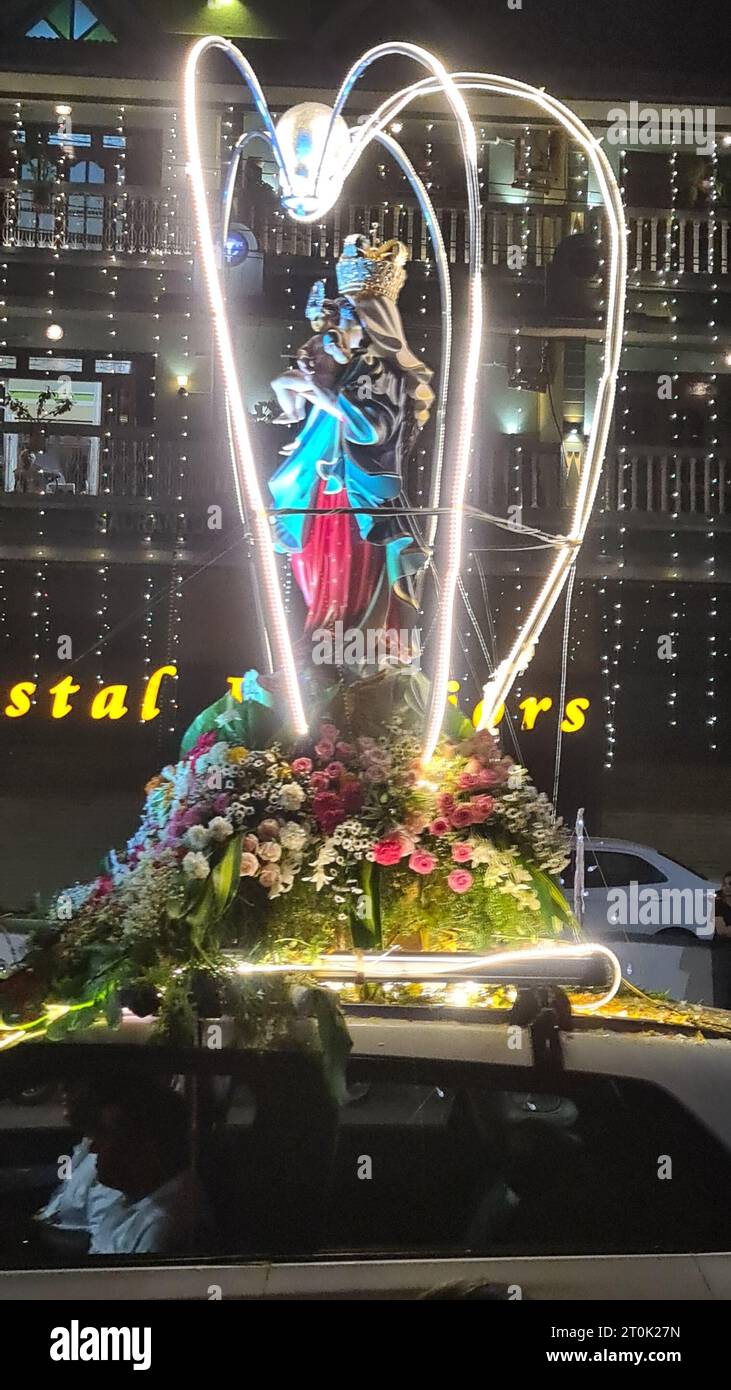 A procession of Our Lady of Rosary taken through the streets of Navelim ...