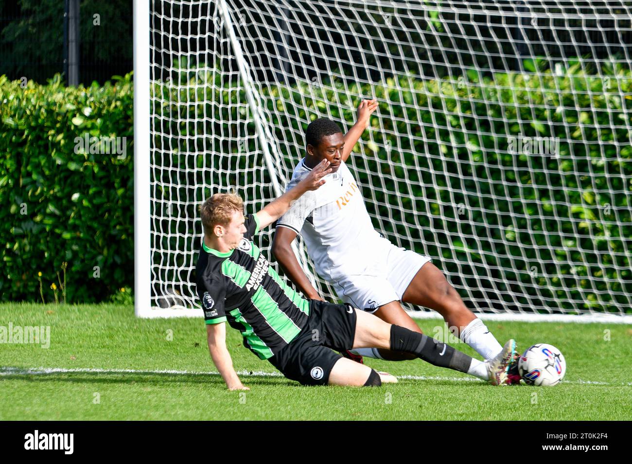 Swansea, Wales. 7 October 2023. Richard Faakye of Swansea City battles ...