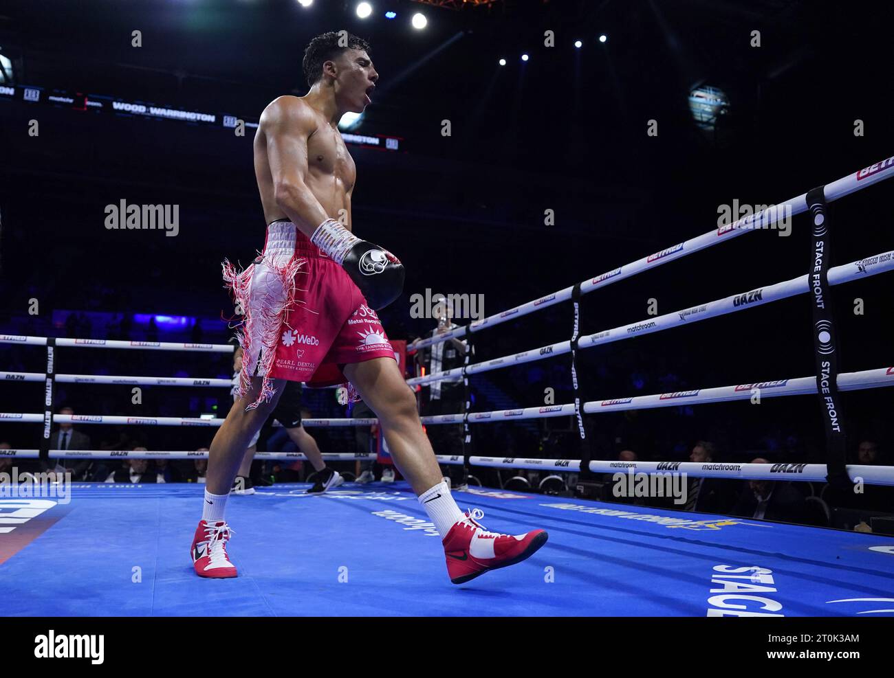 Junaid Bostan celebrates victory over Corey McCulloch in a ...