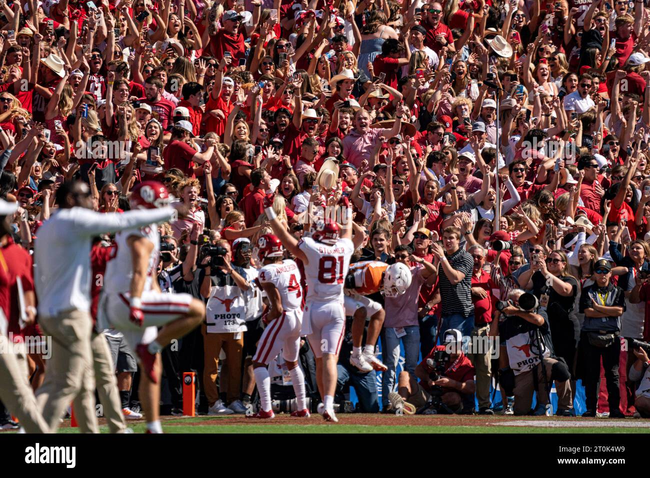 Oklahoma fans celebrate the game-winning touchdown reception by wide ...