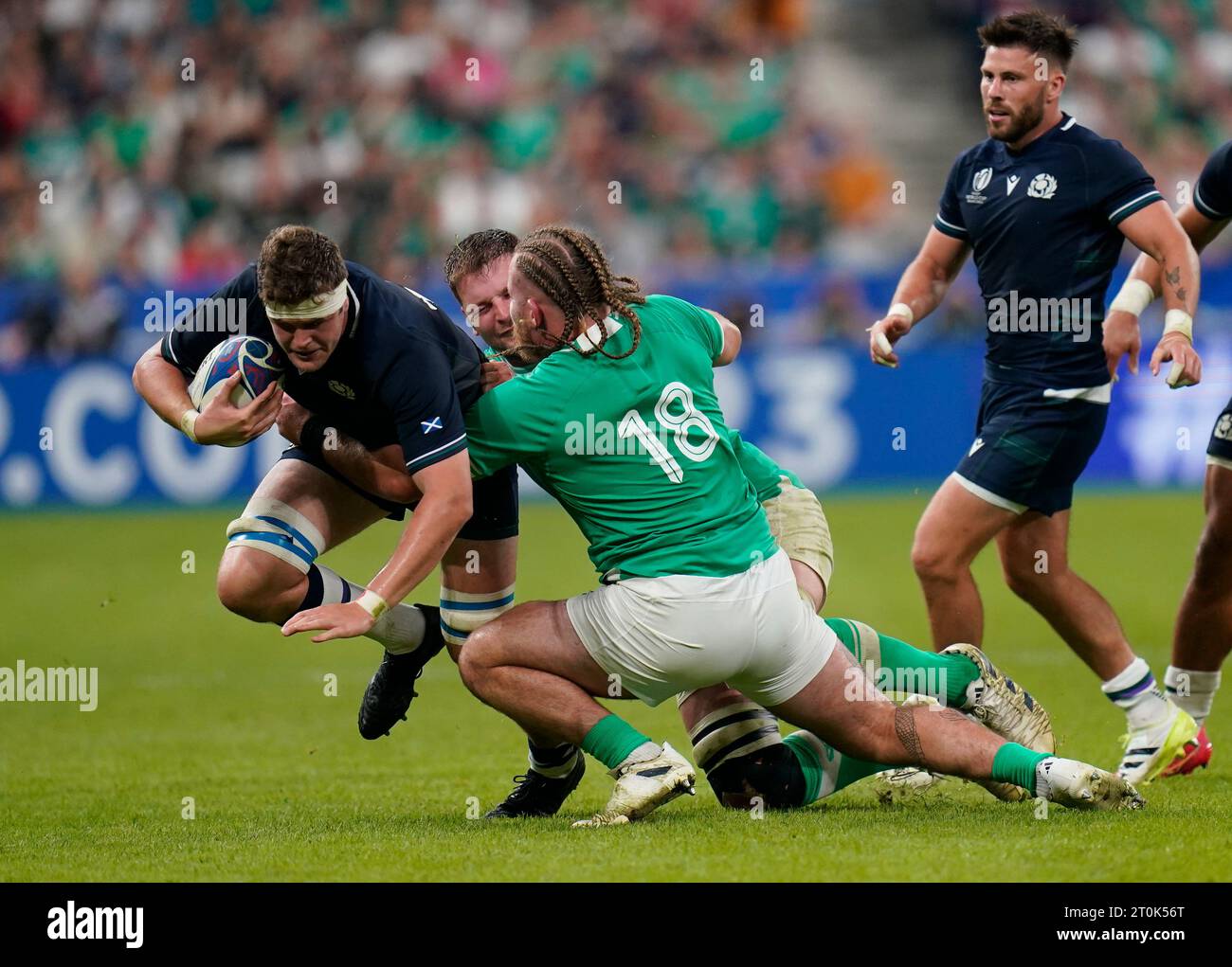 Scotland's Scott Cummings is tackled by Ireland's Finlay Bealham during ...