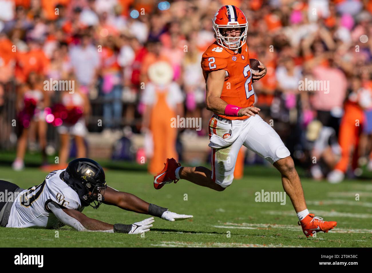 Clemson quarterback Cade Klubnik (2) runs with the ball while pursued ...