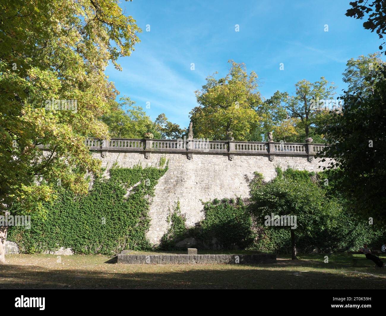 Baroque balustrade with sandstone statues in the court garden in front ...