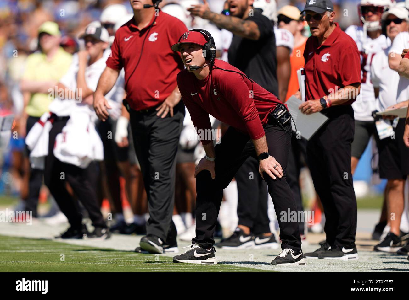 Washington State head coach Jake Dickert watches a field goal attempt ...