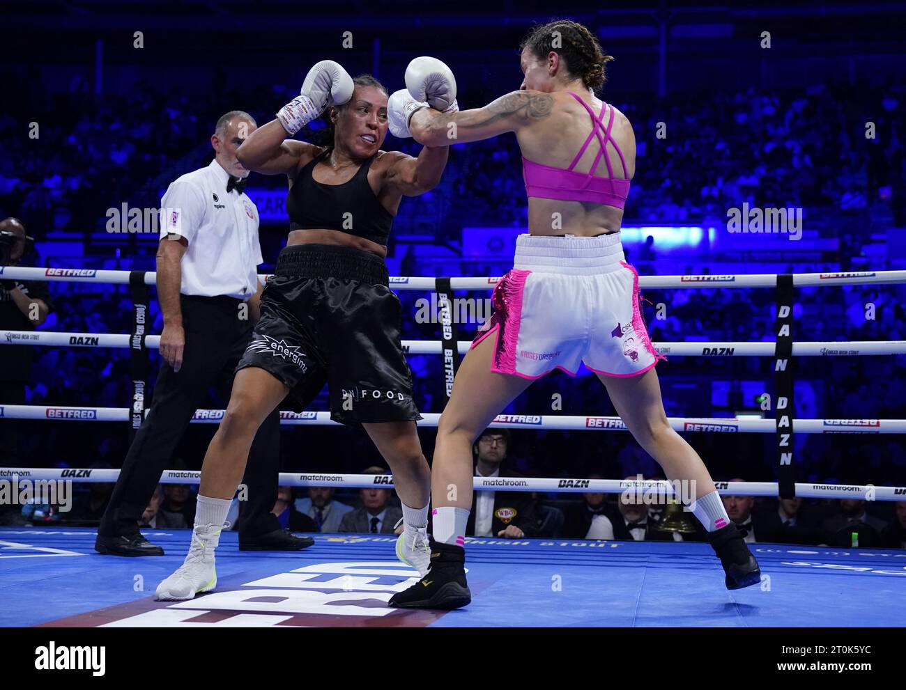 Cecilia Braekhus (left) and Terri Harper (right) in their WBA & WBO Super-Welterweight World ...