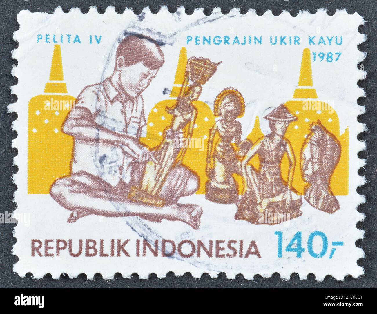 Cancelled postage stamp printed by Indonesia, that shows Carving ...