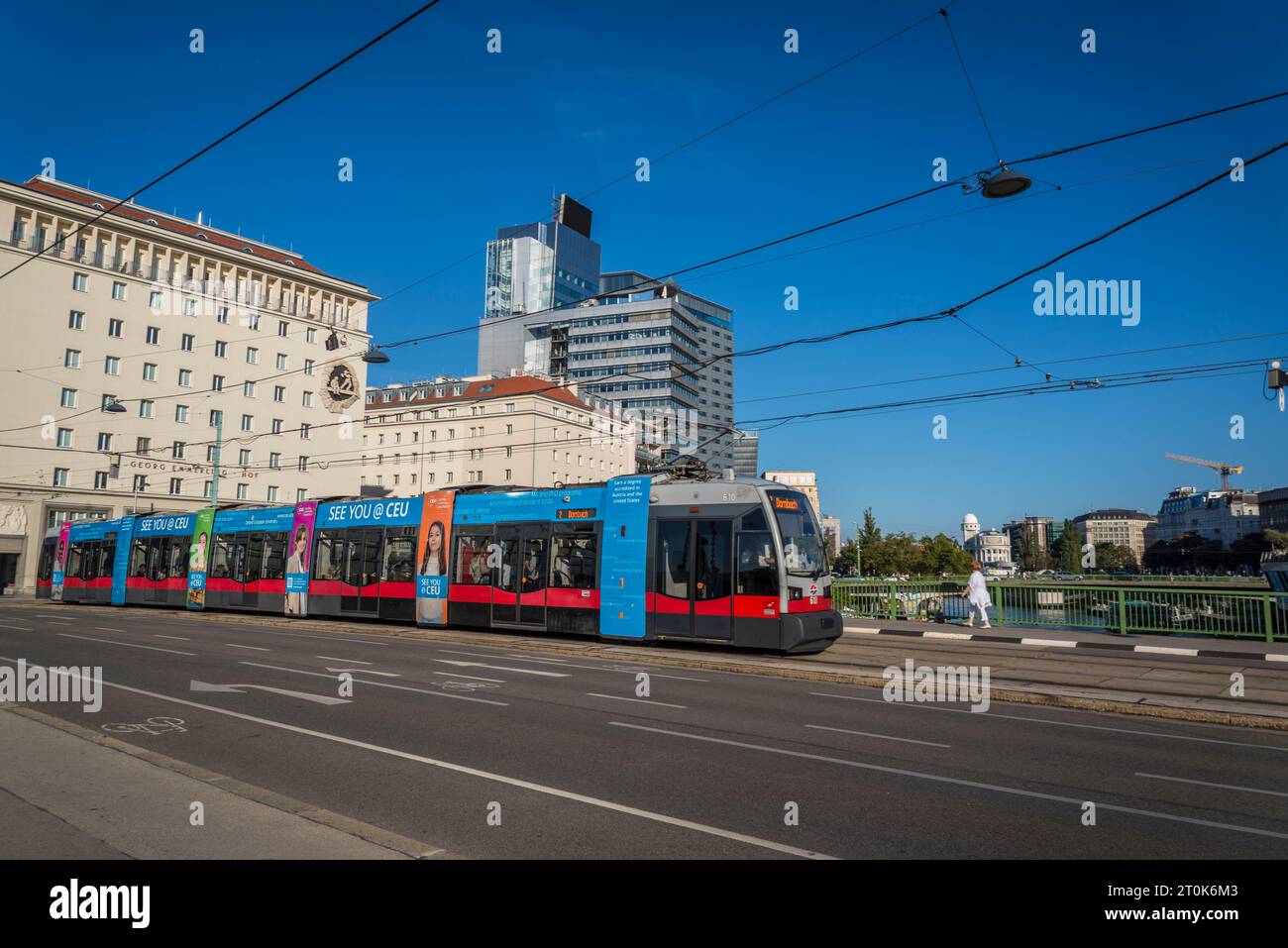 Tram on Augartenbrücke or Augarten bridge crossing the Danube canal ...