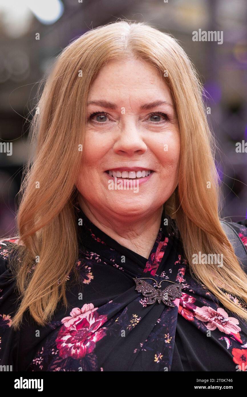 Ellen Lewis poses for photographers upon arrival for the premiere of ...