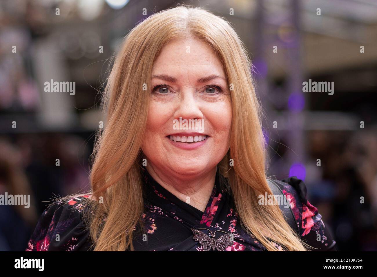 Ellen Lewis poses for photographers upon arrival for the premiere of ...