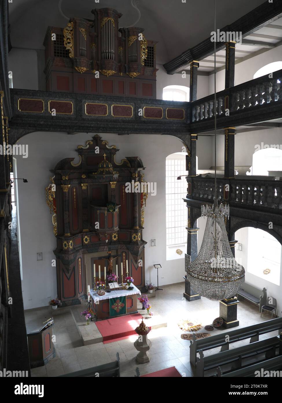 Baroque altar in the two-story interior of a church in Maroldsweisach ...