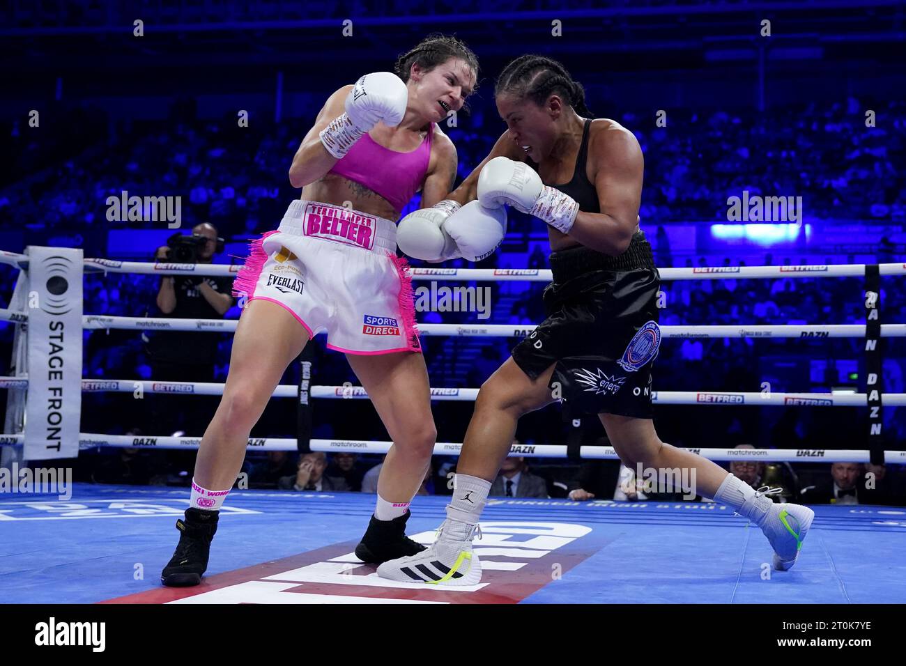 Terri Harper (left) and Cecilia Braekhus in action in their WBA & WBO Super-Welterweight World ...