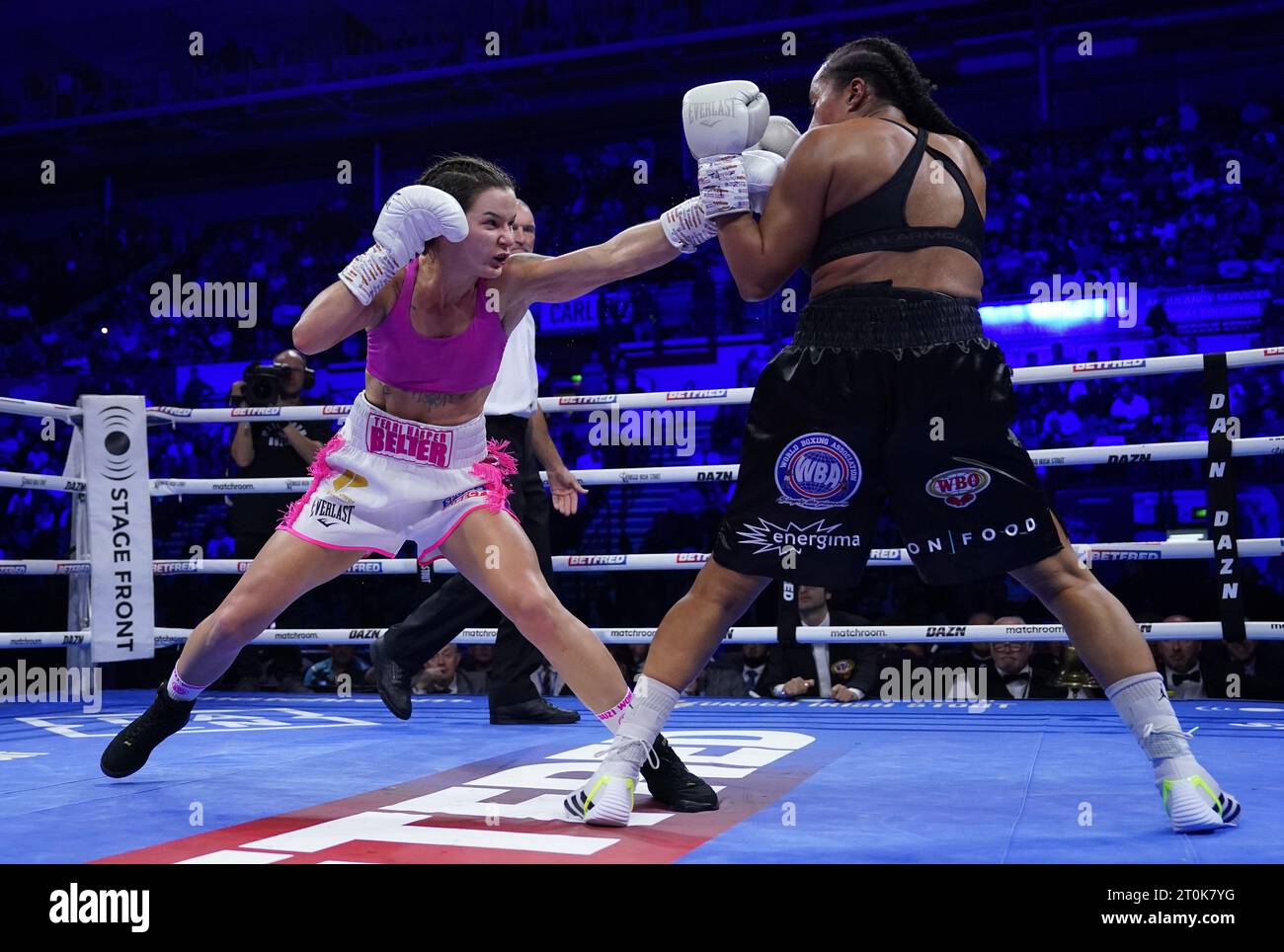 Terri Harper (left) and Cecilia Braekhus in action in their WBA & WBO Super-Welterweight World ...
