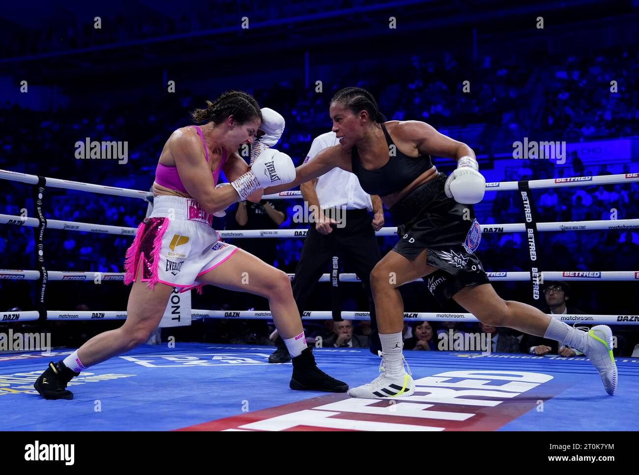 Terri Harper (left) and Cecilia Braekhus in action in their WBA & WBO Super-Welterweight World ...