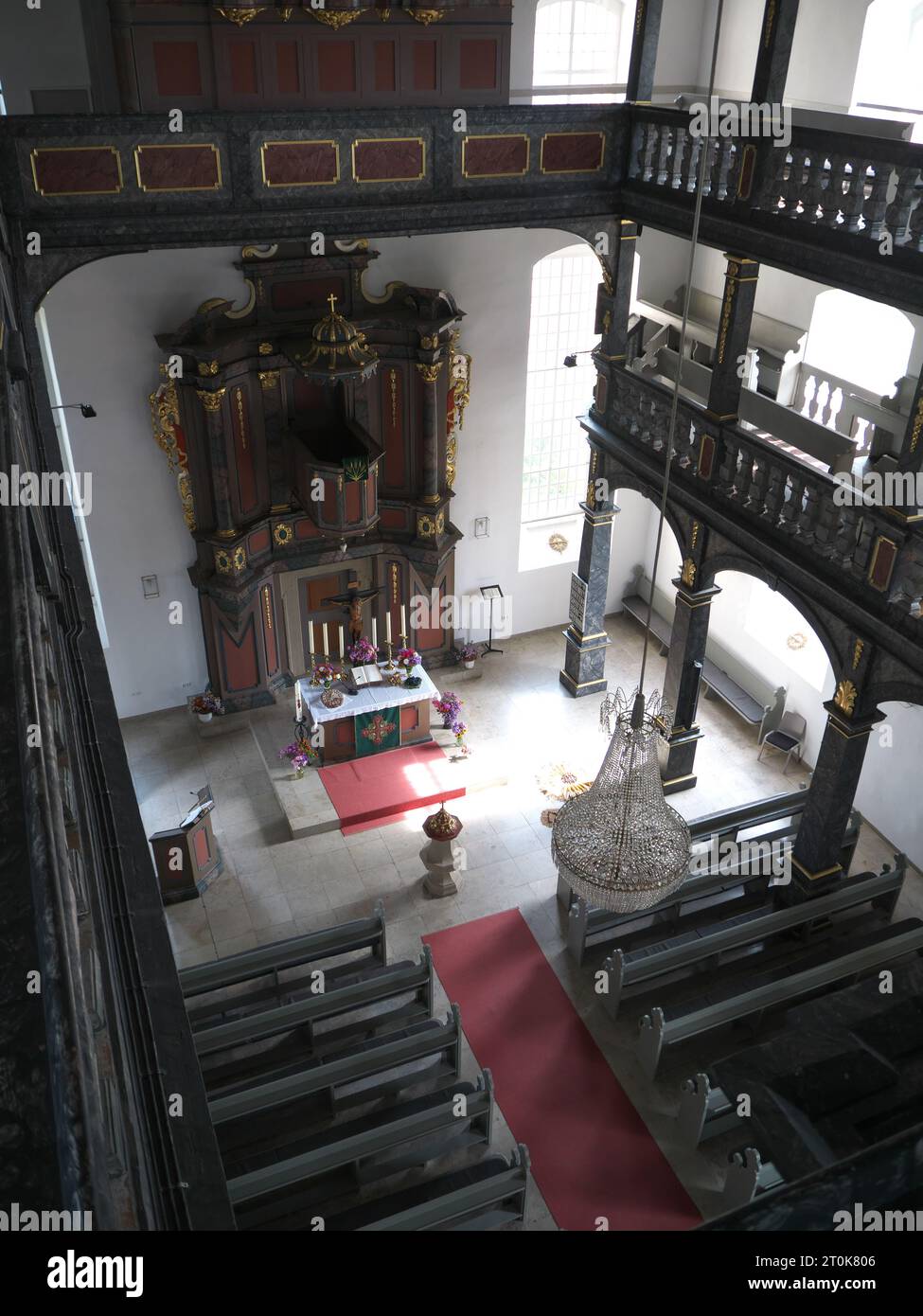 Baroque altar in the two-story interior of a church in Maroldsweisach ...