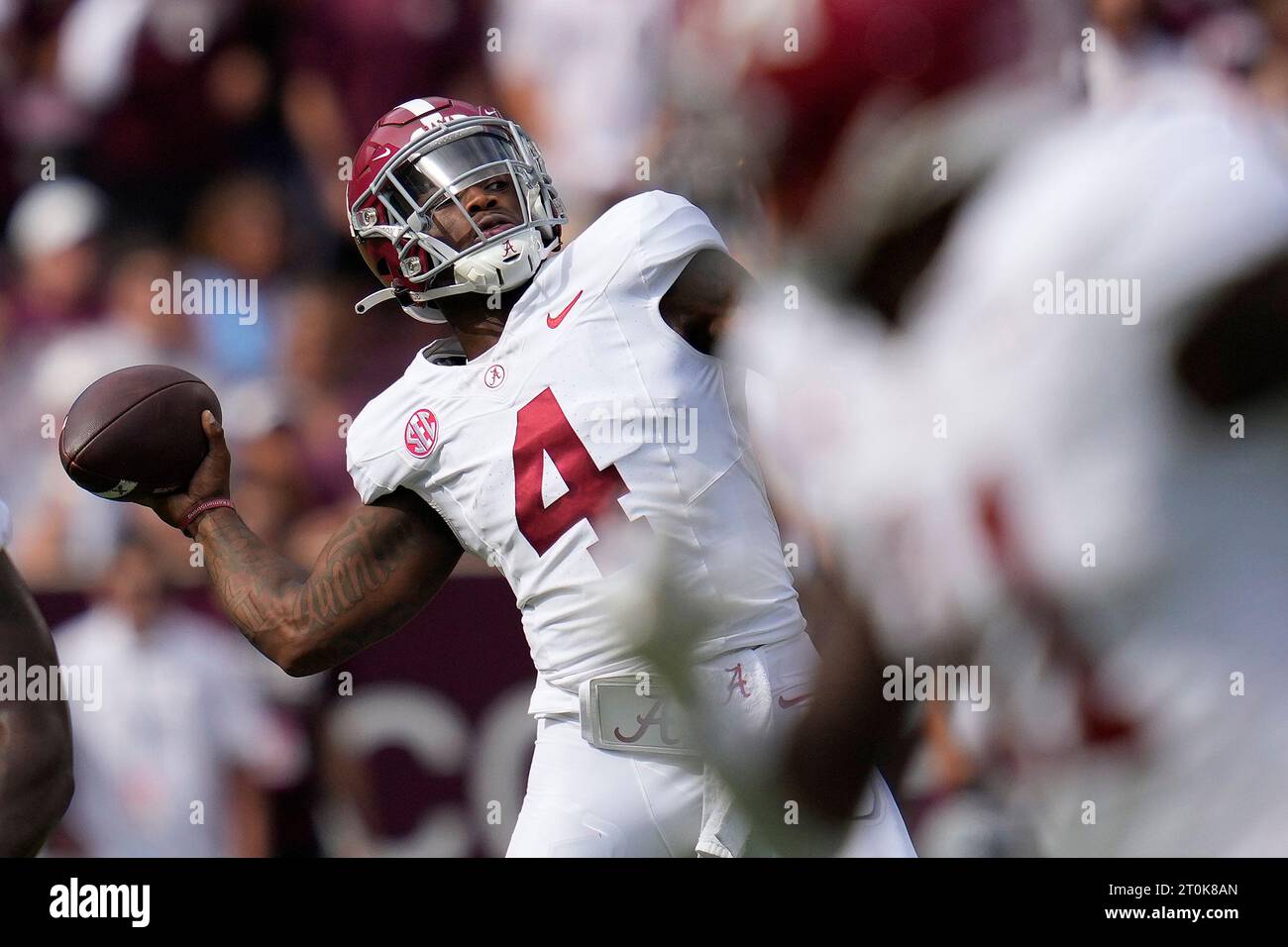 Alabama quarterback Jalen Milroe looks to throw a touchdown pass ...