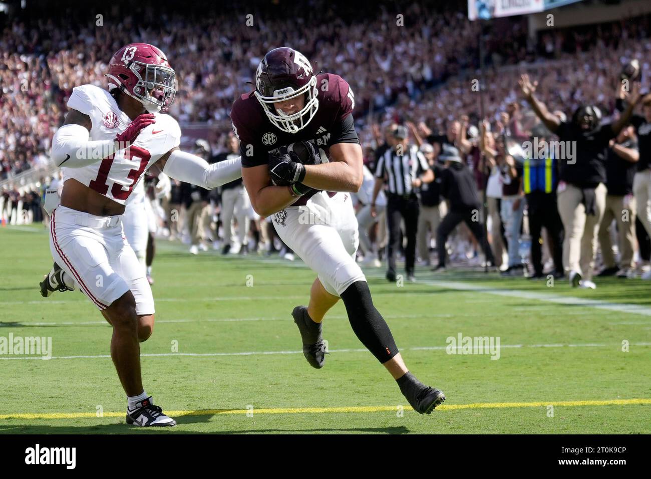 Texas A&M tight end Jake Johnson, right, catches a pass for a touchdown ...