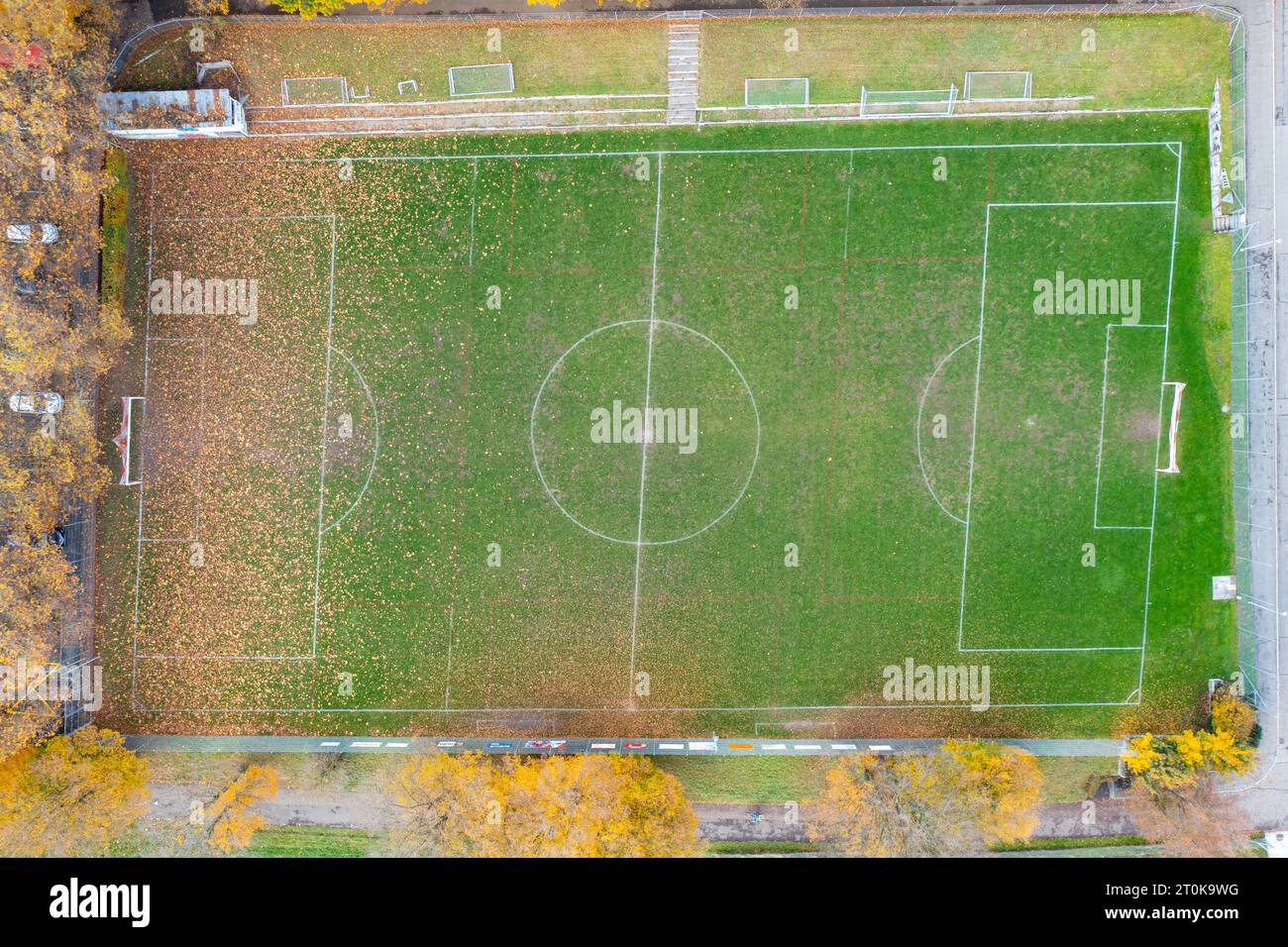 Drone top down view of beautiful shcool football field in autumn ...