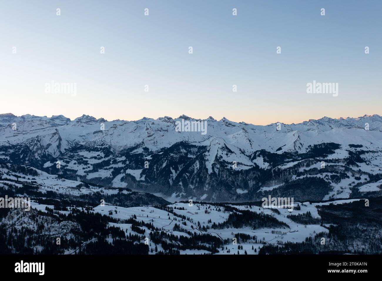 Sunset in the snowy Bregenzer Wald area of Vorarlberg, Austria with ...