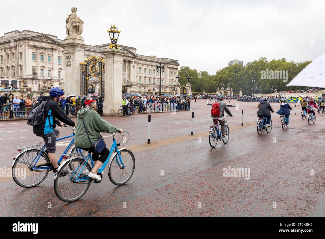 London England cycling tour group rides along spur road towards ...