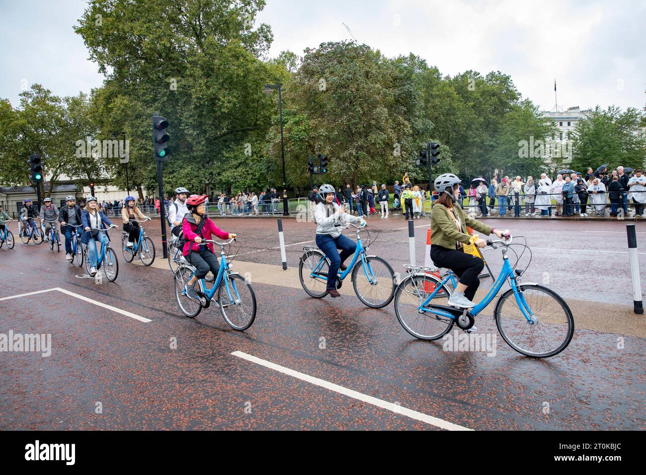 London England cycling tour group rides along spur road towards ...