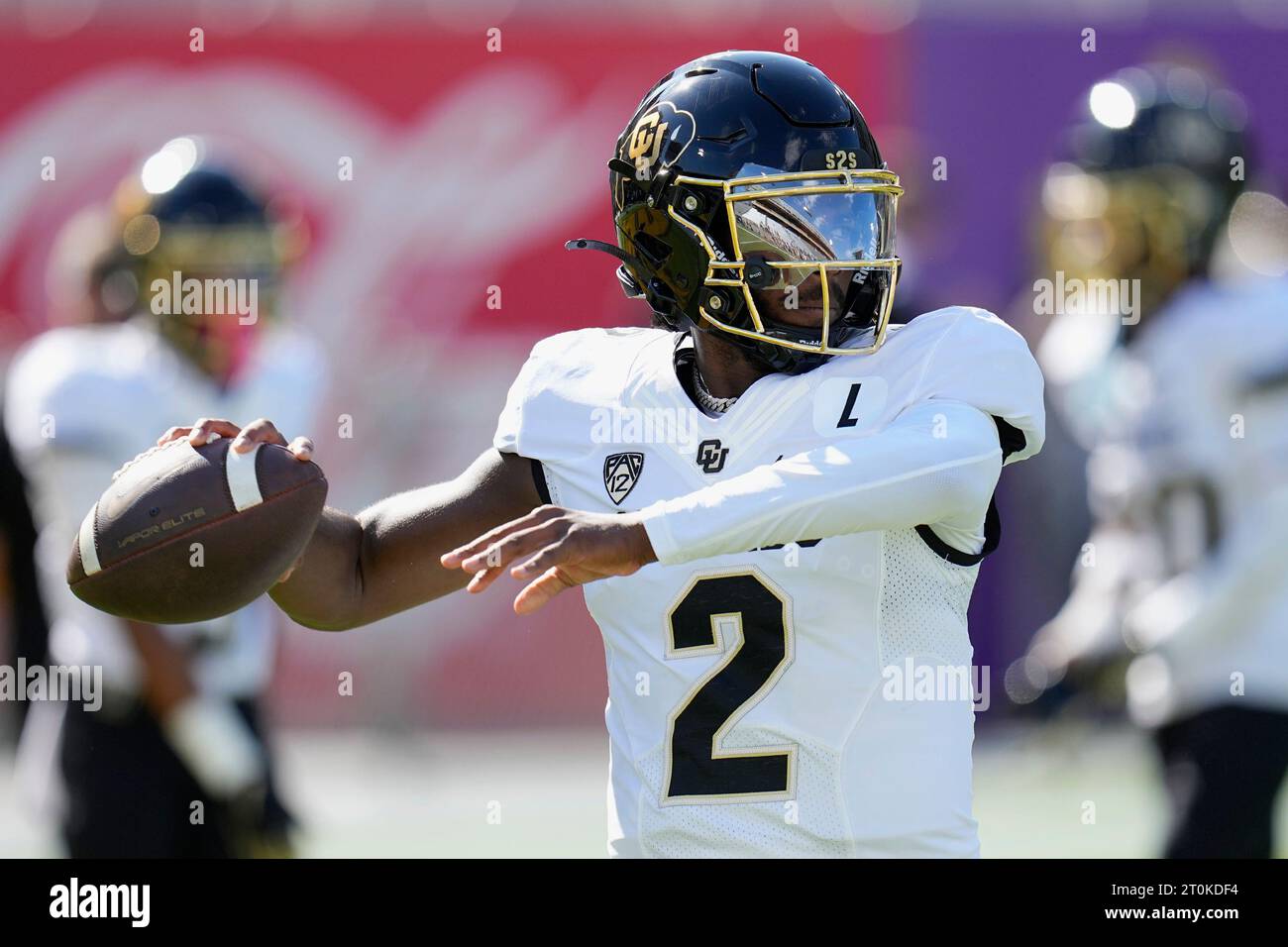 Colorado quarterback Shedeur Sanders warms up prior to an NCAA college ...